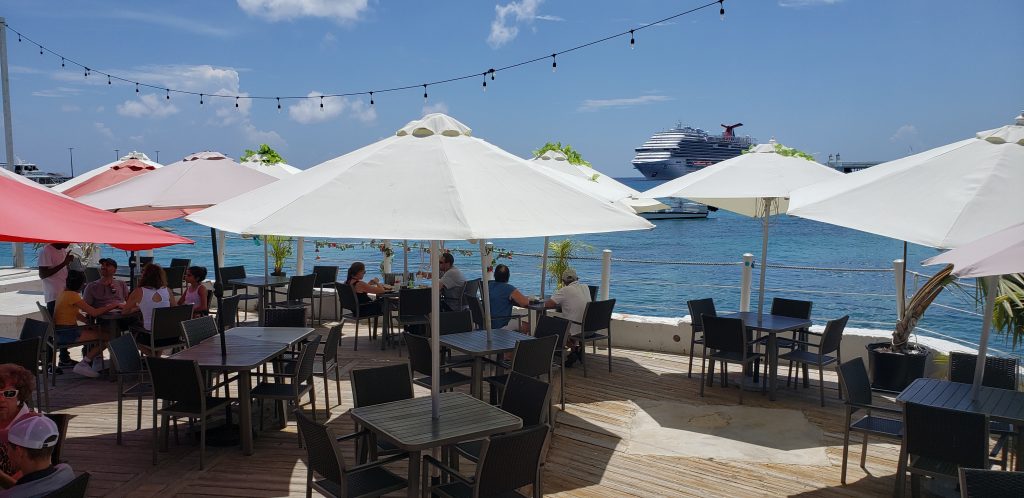 The seating at Cayman Cabana offered gorgeous views. - Dine Drink Travel